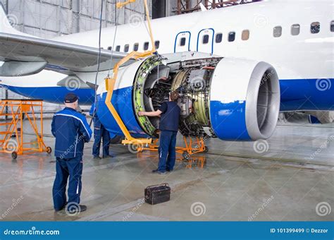 Replacing The Engine On The Airplane Working People Concept Maintenance Of Aircraft Editorial