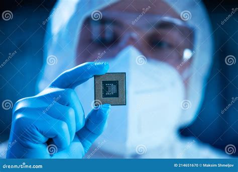 microelectronics engineer works in a modern scientific laboratory on computing systems and