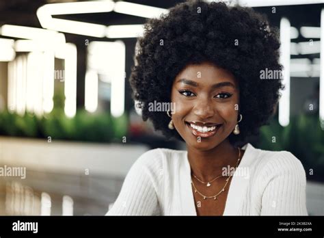 Young African Woman Customer Getting A Hairstyle At A Beauty Salon