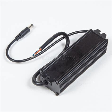 Led Driver Power Supply Ac Adapter In Black Housing With Barrel Connetor On White Background