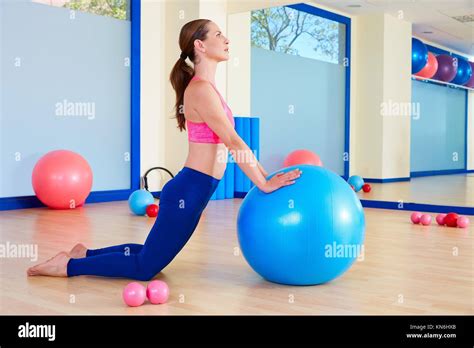 Pilates Woman Fitball Swiss Ball Exercise Workout At Gym Indoor Stock