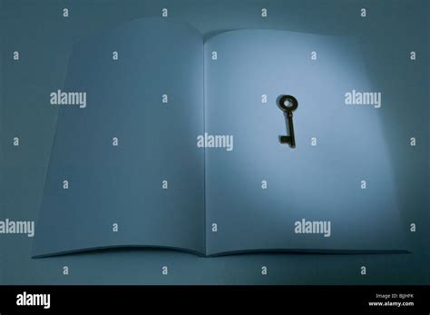 Antique Key On A Notebook Stock Photo Alamy
