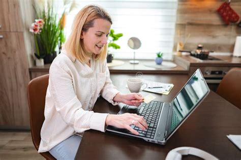 Bright Workspace With Young Woman Engaged In Creative Laptop Tasks Stock Image Image Of