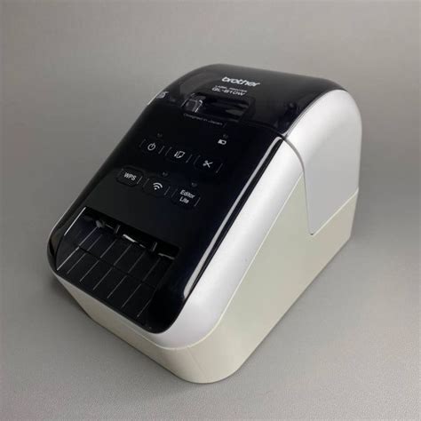 Термопринтер этикеток Brother Ql 810w серебристый черный