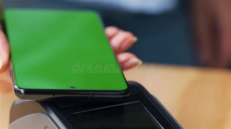 Close Up Of A Woman S Hands Holding A Vertical Mobile Phone And Zooming