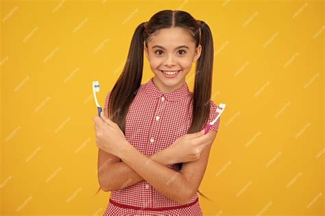 Premium Photo Oral Hygiene Dental Teenage Girl Brushing Her Teeth