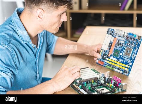 Close Up It Man Learning Motherboard Circuit Stock Photo Alamy