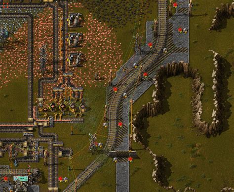 Had To Squeeze An Iron Port Behind My Base Now Due To Cliffs My Paths Do This R Factorio