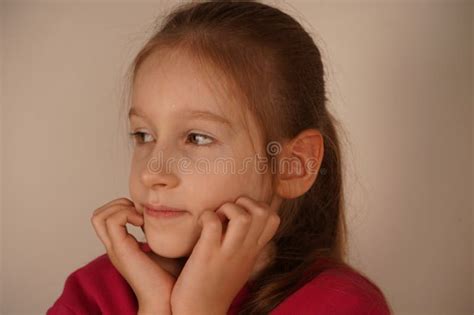 Her Gentle Facial Expression Exudes Calm And Sweetness A Picture