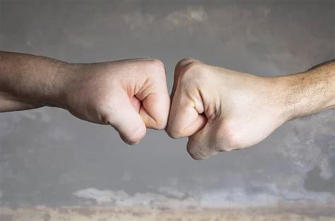 Two Men Fist Bumping Stock Photo Nito103 152779558
