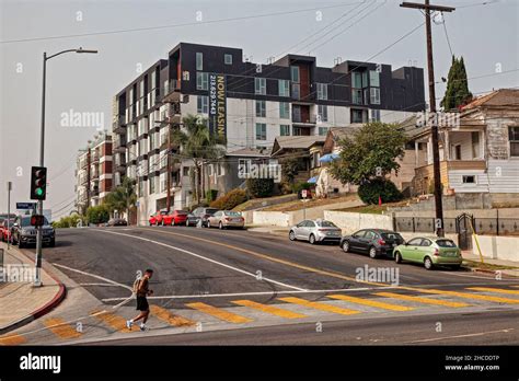 A Now Leasing” Sign Hangs From A Recently Constructed Multi Unit
