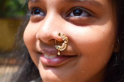Premium Photo Close Up Portrait Of Girl Wearing Nose Ring