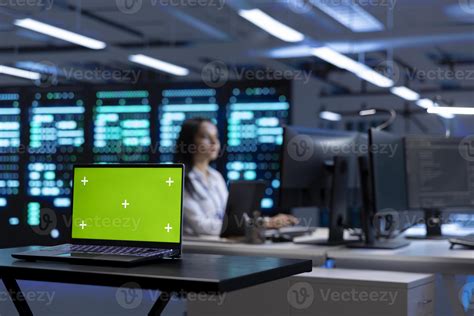 Focus On Green Screen Laptop In Data Center Facility Managing Rackmounts Energy Consumption