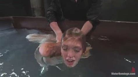 Naked Fetish Slut Gets Tied Up And Submerged In Water