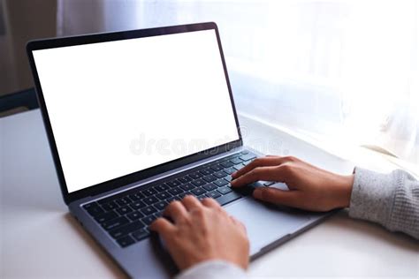 A Businesswoman Using And Typing On Laptop Computer Keyboard With Blank