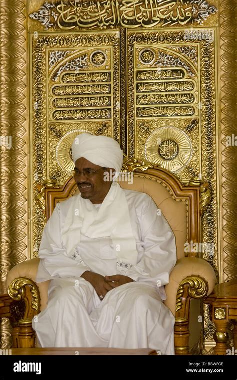 Sudanese President Omar Hassan Ahmad Al Bashir Seated Against Gold