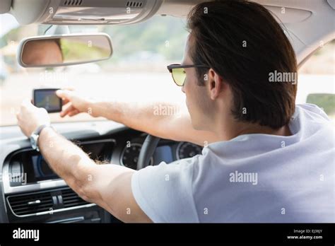 Man Using Satellite Navigation System Stock Photo Alamy
