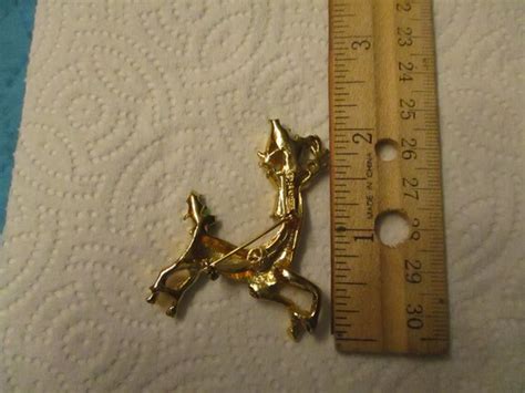 Prancing Gold Tone Reindeer Pin W Glass Mistletoe On Gem