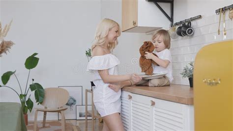 Mom Teaches Her Son About Household Chores The Boy Helps With Housework Stock Video Video Of