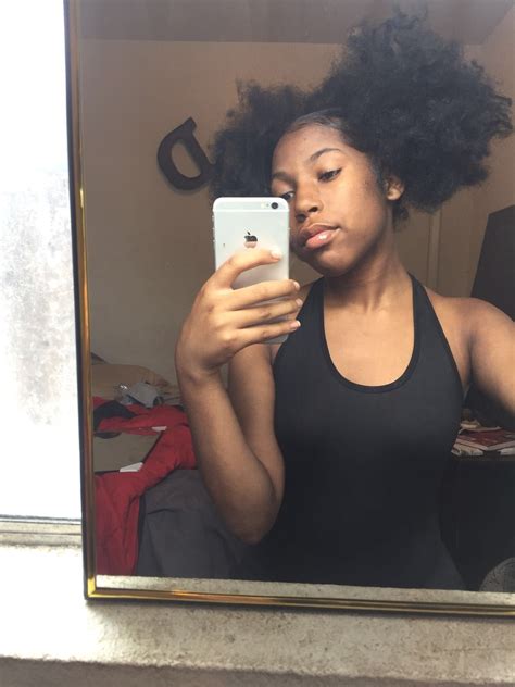 Ebony Nude Selfie Young African Woman Taking A By Stocksy
