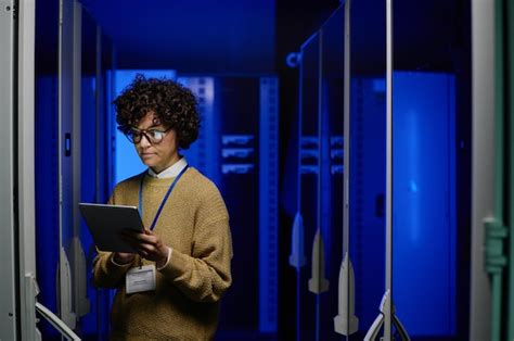 Premium Photo Woman Using Tablet Pc In Data Center
