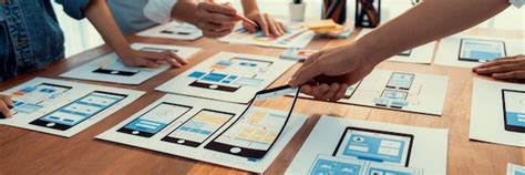 Premium Photo Panorama Shot Of Frontend Developer Team Brainstorming Ui And Ux Designs For