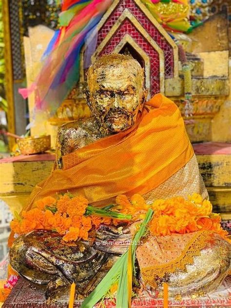 เหรียญปรกใบมะขามหลวงปู่ทวดจิ๋วรุ่นสรงน้ำ วัดช้างให้ ปัตตานี ปี2542 Ennxo