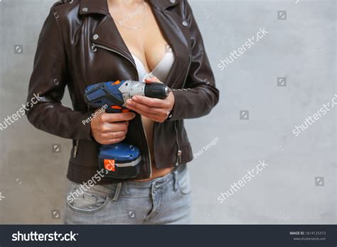 Sexy Woman Holds Electrical Screwdriver On Stock Photo Shutterstock
