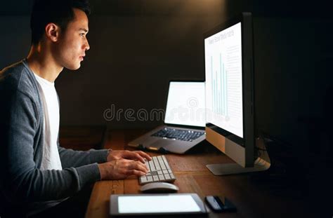 businessman night and computer in office with analytics screen for feedback review and cyber