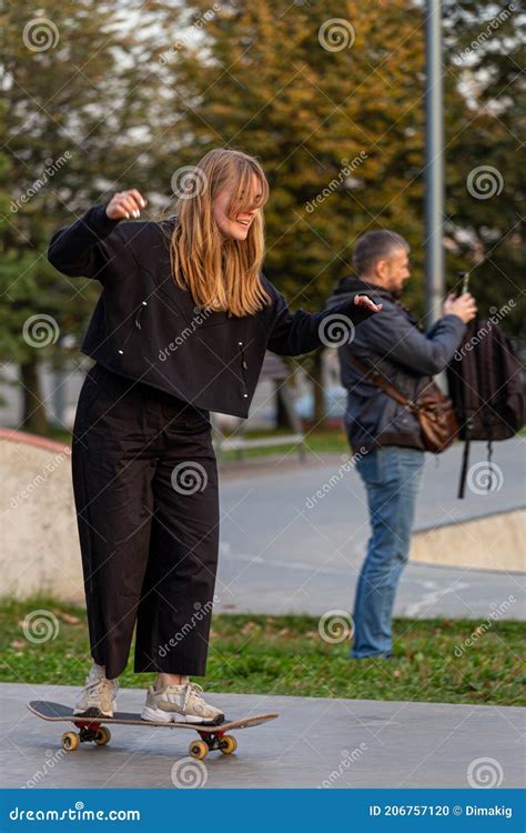 A Teenager Girl Skateboarding In The Park Study Of Skateboarding