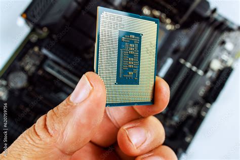An Expert Technician Is Putting Together Desktop Computer Cpu Is Plug Into Motherboard Socket