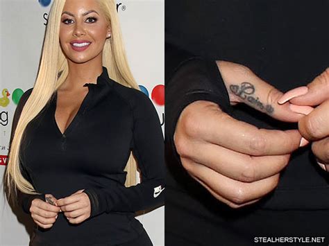 Amber Rose S Tattoos Meanings Steal Her Style