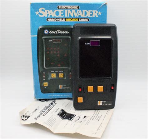 Vintage Space Invaders Handheld Arcade Video Game Red Led Digital Light And Sound In Box With