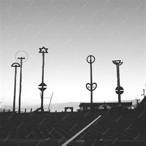 Premium Photo Silhouette Of Decorations On Promenade