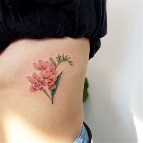 22 Beautiful And Delicate Freesia Tattoo Designs Tattooadore
