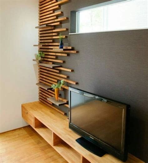 دکوراسیون دیوار تلويزيون تلفیق جالب چوب و با رنگ خنثی فن و هنر