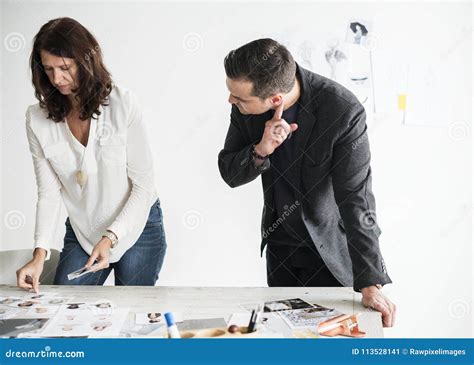 Magazine Editor Selecting Models Together Stock Image Image Of Couple