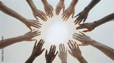 Conceptual Symbol Of Multiracial Human Hands Making A Circle On White Background With A Copy