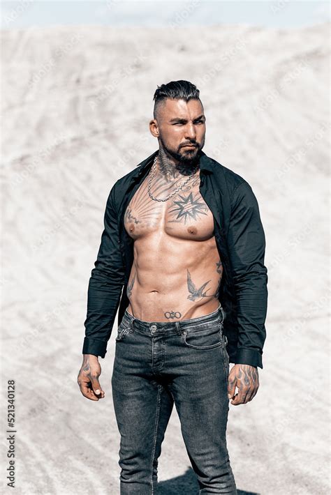 Sexy Portrait Of Muscular Handsome Topless Male Model At The Beach