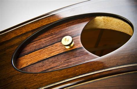 A Close Up Of A Wooden Object With A Hole In It