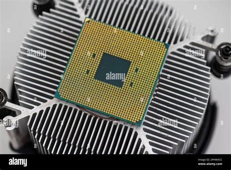 Back Of A AMD Socket AM CPU Mounted On A Cooler Stock Photo Alamy