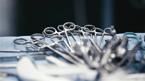 Medical Instruments In Steel Tray On Table For Surgery Preparing Of