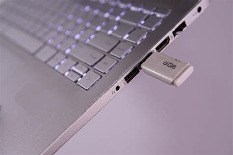 Premium Photo Usb Plugged Into The Laptop For Data Transfer