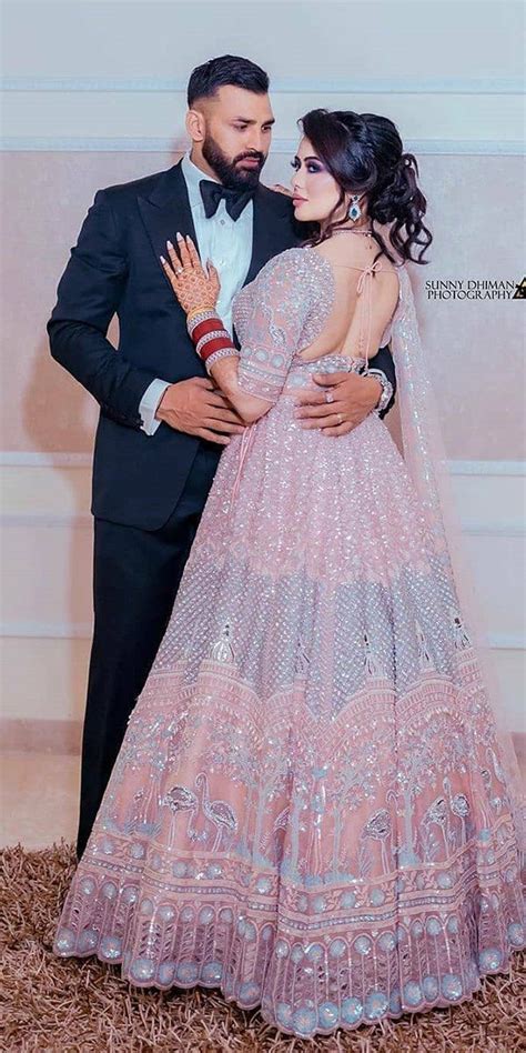 Indian Wedding Dresses 18 Unusual Looks And Faqs Indian Wedding Reception Gowns Indian Wedding
