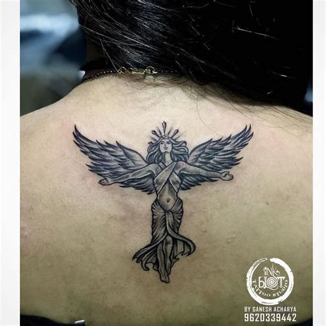 A Female Angel With Open Arms Angel Tattoo Angel Tattoo Designs