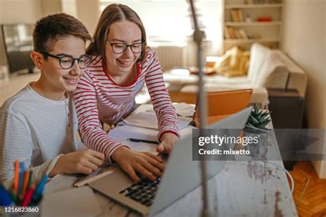 Sister Teaches Brother Photos And Premium High Res Pictures Getty Images