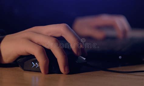 Close Up Of Man Gamer Hands Using Computer Mouse Is Playing Video Game At Night Male Hacker