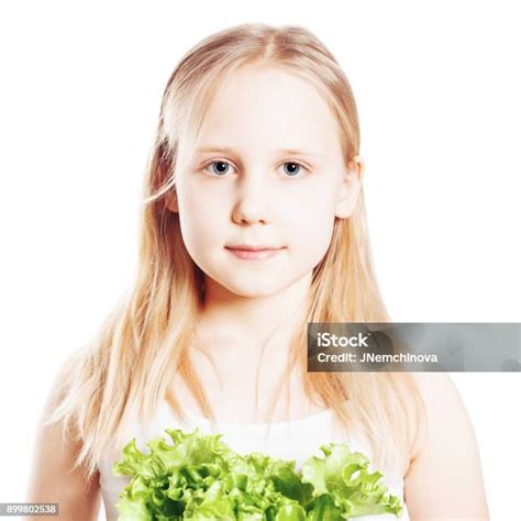 Portrait Of Teen Girl With Green Vegetable Healthy Eating Concept Stock