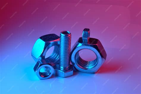 Premium Photo Large And Small Nuts And Bolts Highlighted In Different