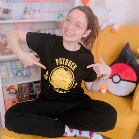 Pokemon Psyduck College T Shirt Black Elbenwald